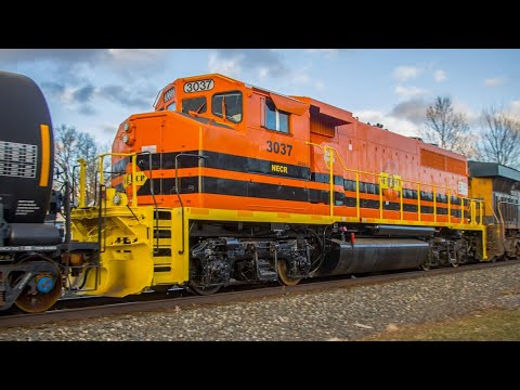 CSX M364-21 with New England Central Railroad (NECR) 3037 a GP40-2 and a DPU in Fairport NY 3-22 ...