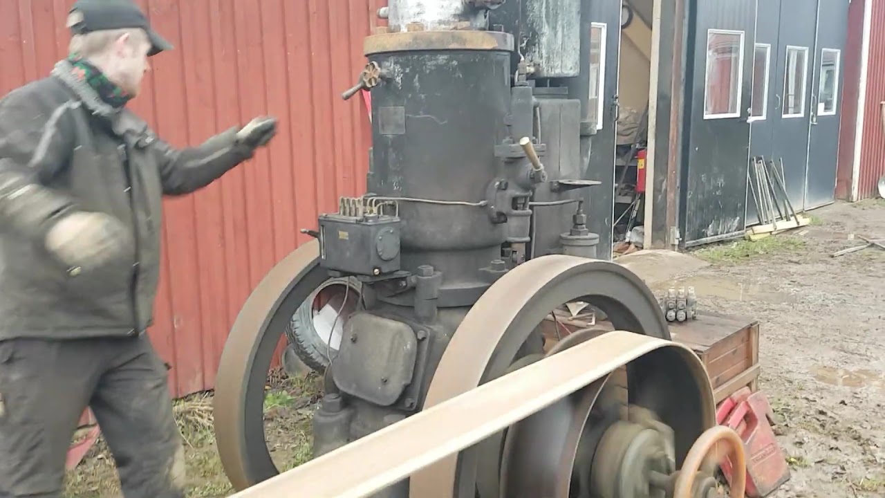 A big Storebro Hot Bulb Engine is being run - YouTube