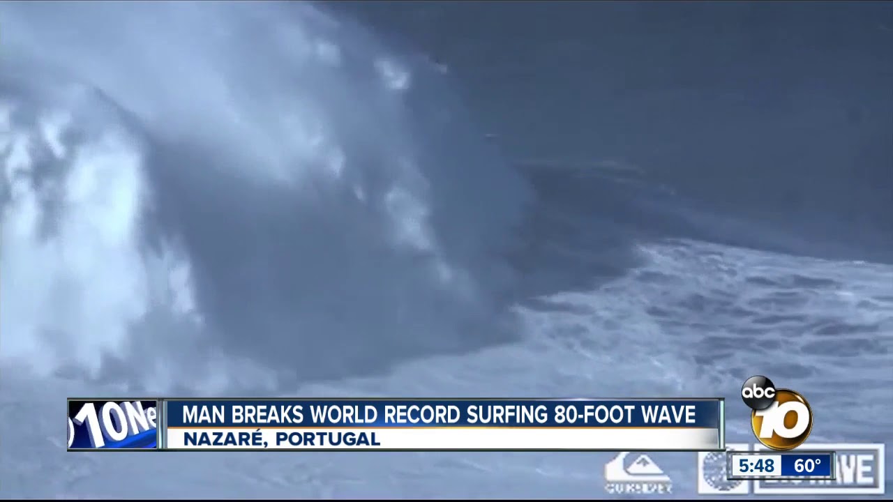 Man breaks record surfing 80-foot wave - YouTube