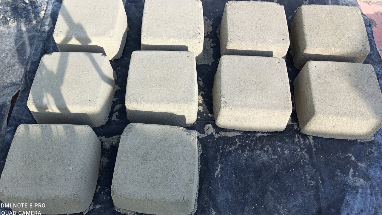 Big block series 3: soft cementsnd square shapes crumbling in water and ...