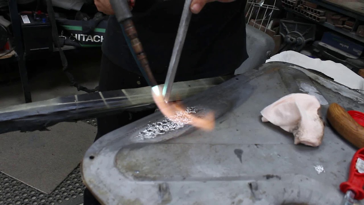 Lead wiping FE Holden fuel tank top - YouTube