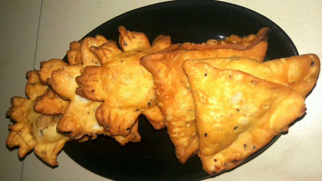 ସିଙ୍ଗଡା।New types sunflower samosa recipe. odia style singada recipe ...