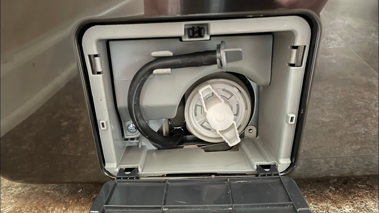 How to clean a filter trap on a front load washing machine to stop ...