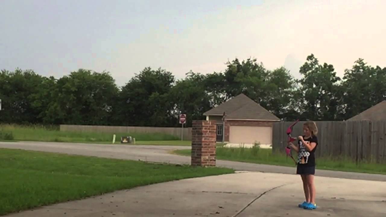 Ava Shooting Her Bow - YouTube