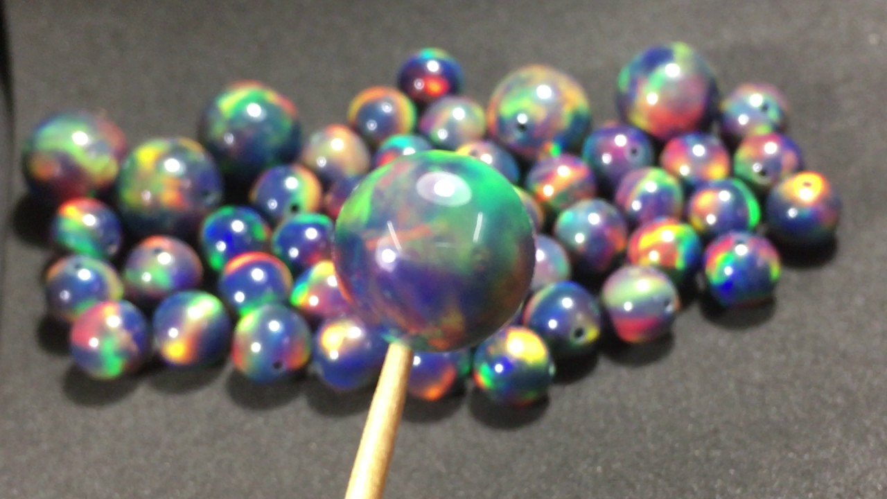 synthetic hybrid opal aurora A round ball - YouTube