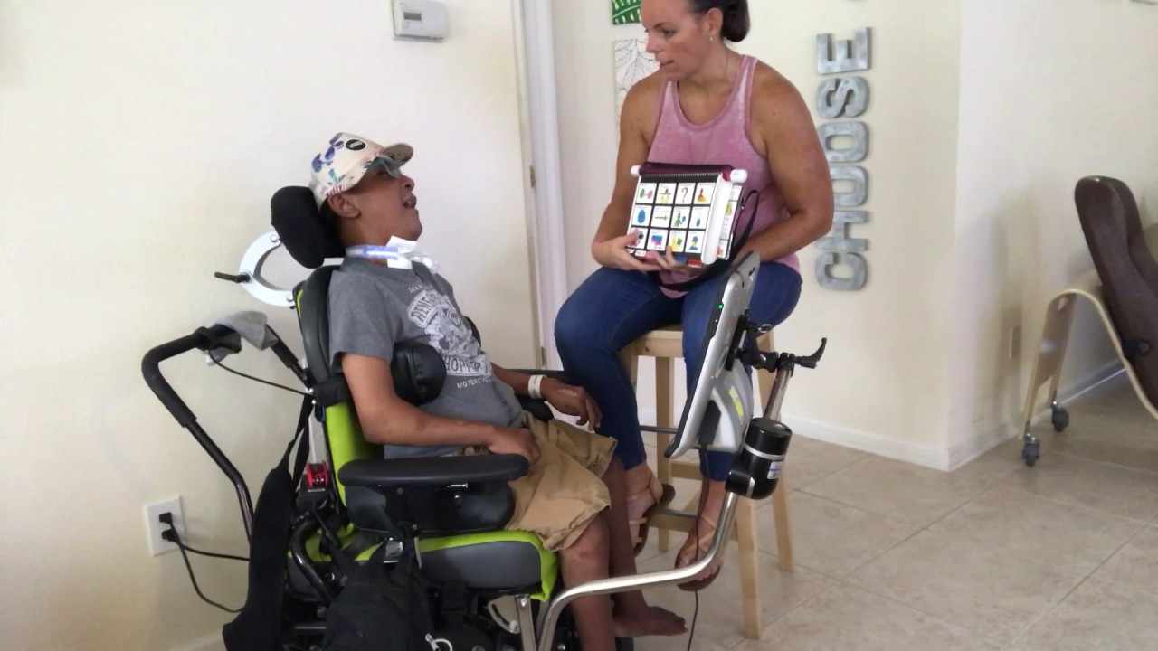 Talking about signally using a wristband using PODD - YouTube