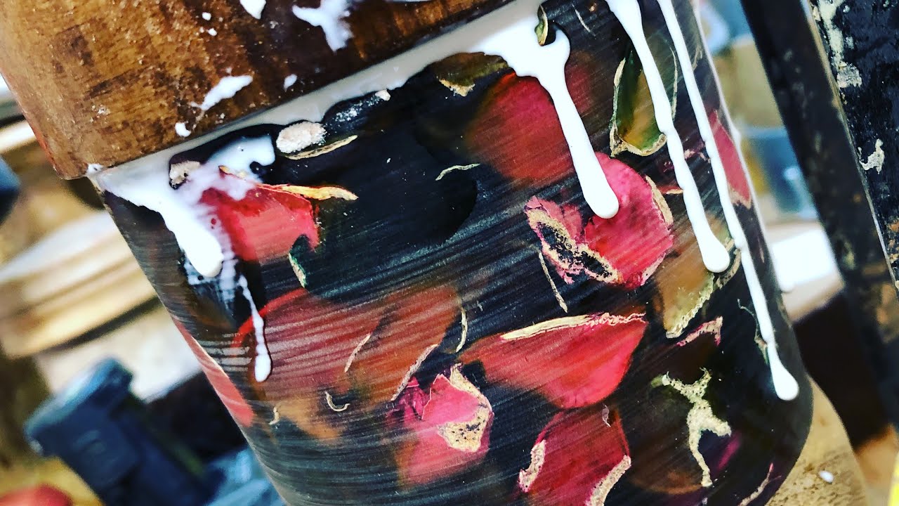 crusty dried flowers mixed with resin turned on a lathe - YouTube