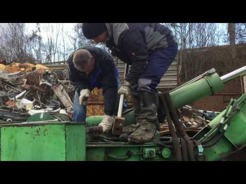 Zerlegen einer Baumaschine