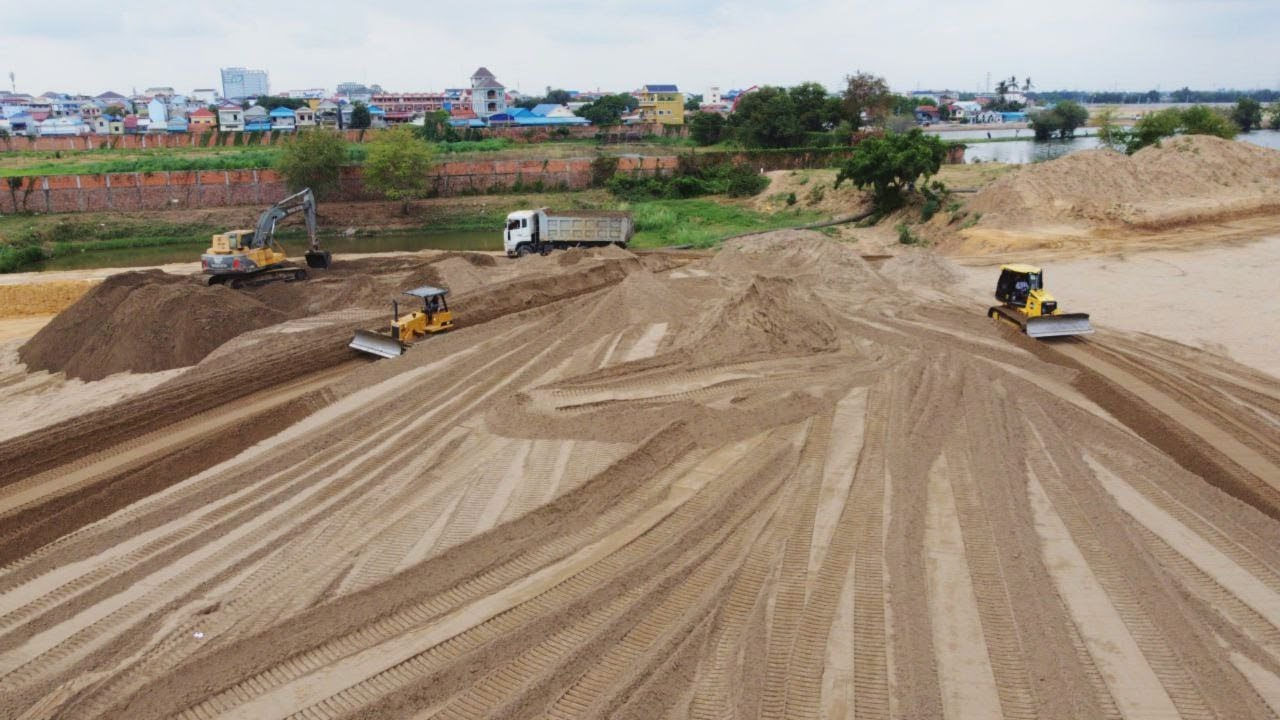 Sand Filling Using 25-Ton Trucks and Bulldozers in Bridge Construction ...