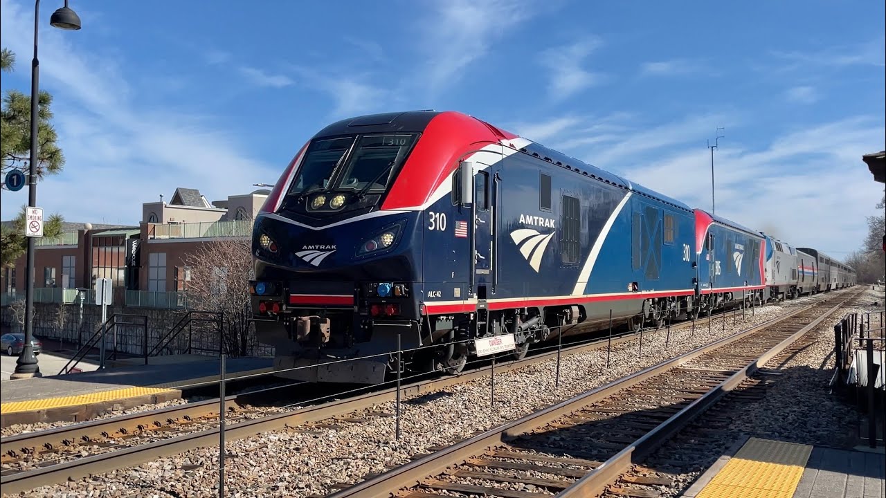 AMTK 310 leading Amtrak 7 past Deerfield in great lighting - YouTube