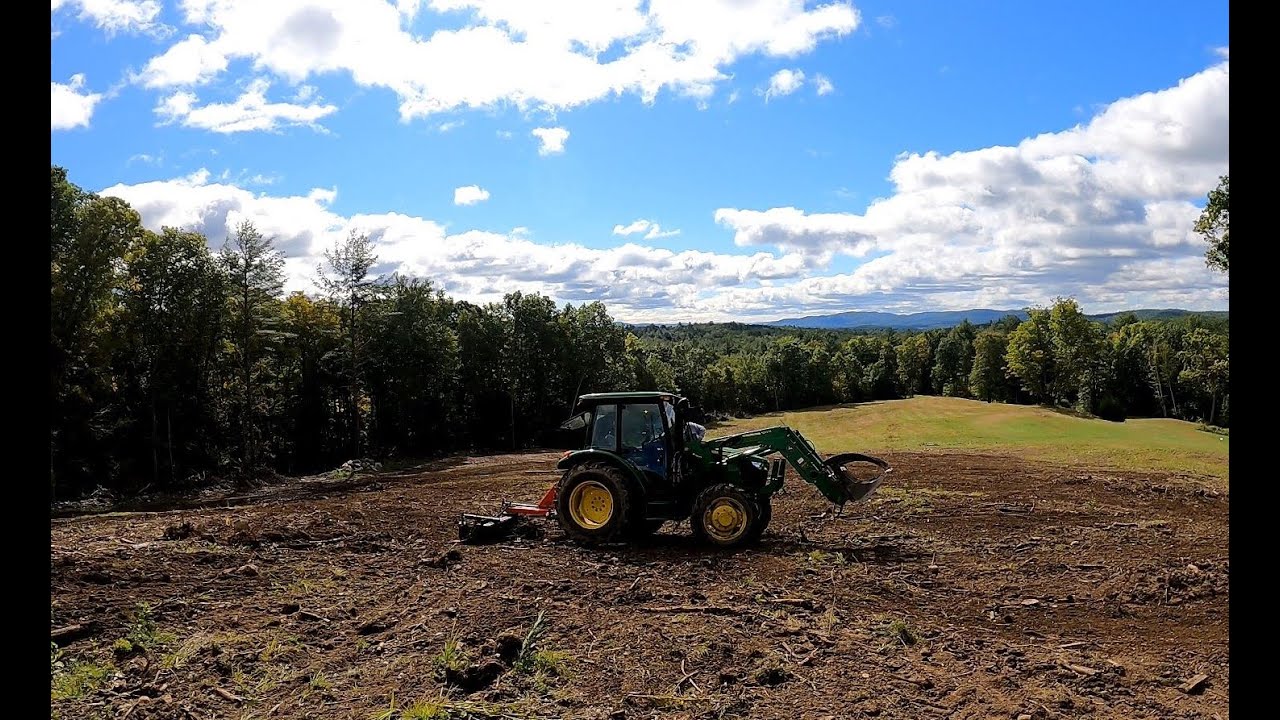 Raking the new field with the 5075E - YouTube