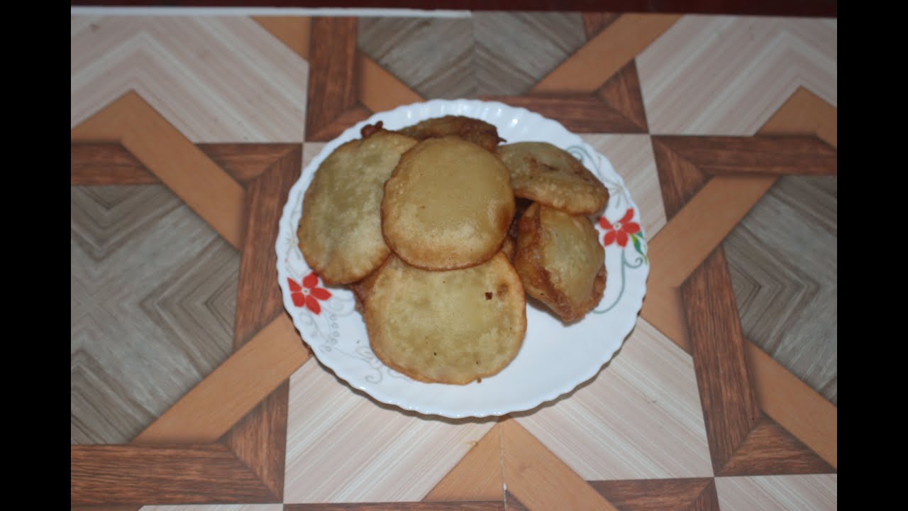 মাটির চুলাই তেলের পিঠা।Earthen oven oil cake. - YouTube