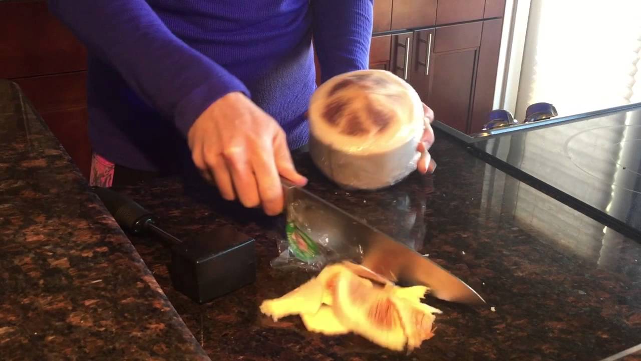 Melissa Shows How to Open a Coconut - YouTube