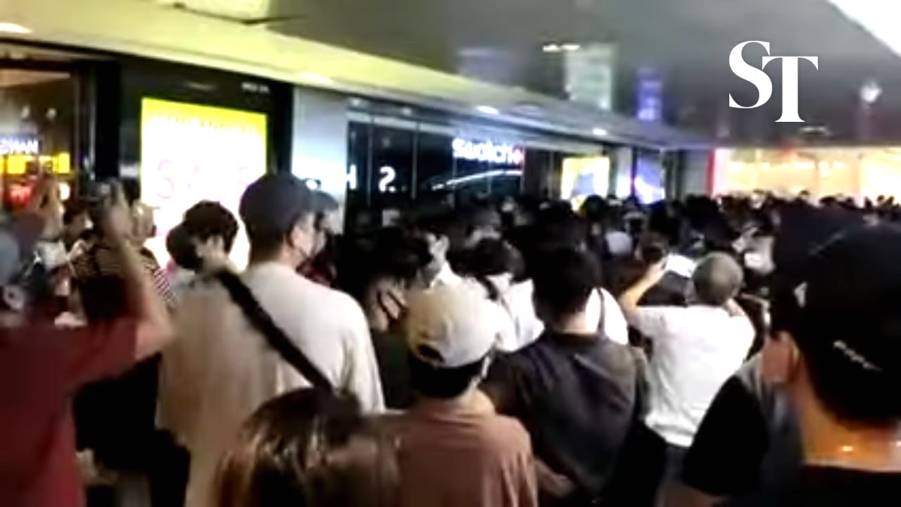 Hundreds wait outside Swatch store at Ion Orchard to buy Omega x Swatch ...