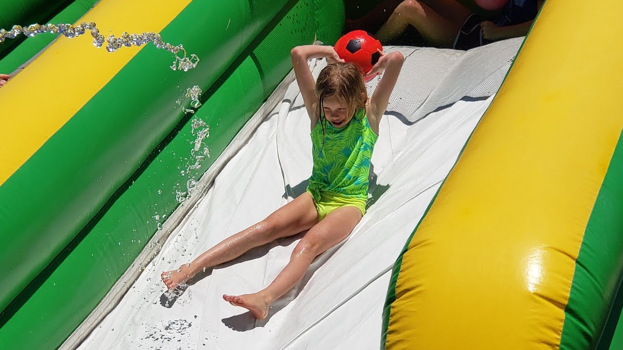 4th of July bounce house slippery slide fun with aunts, uncles ...