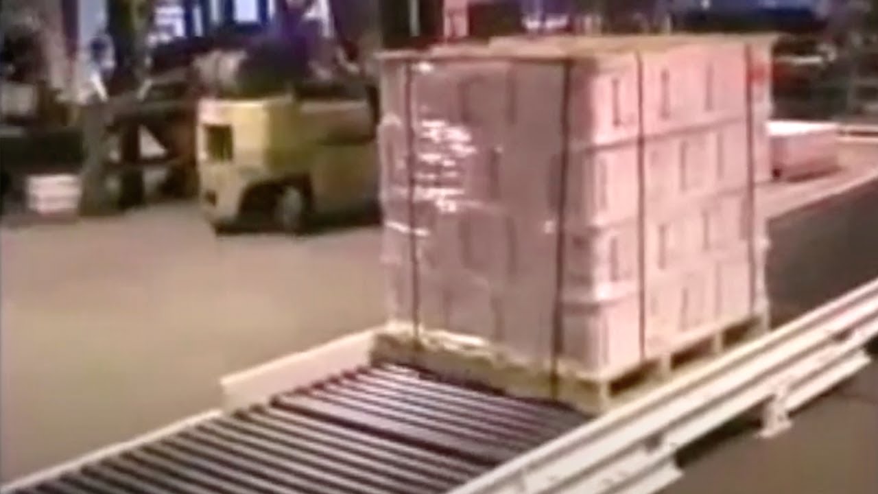 Gravity Pallet Flow Conveyor - YouTube