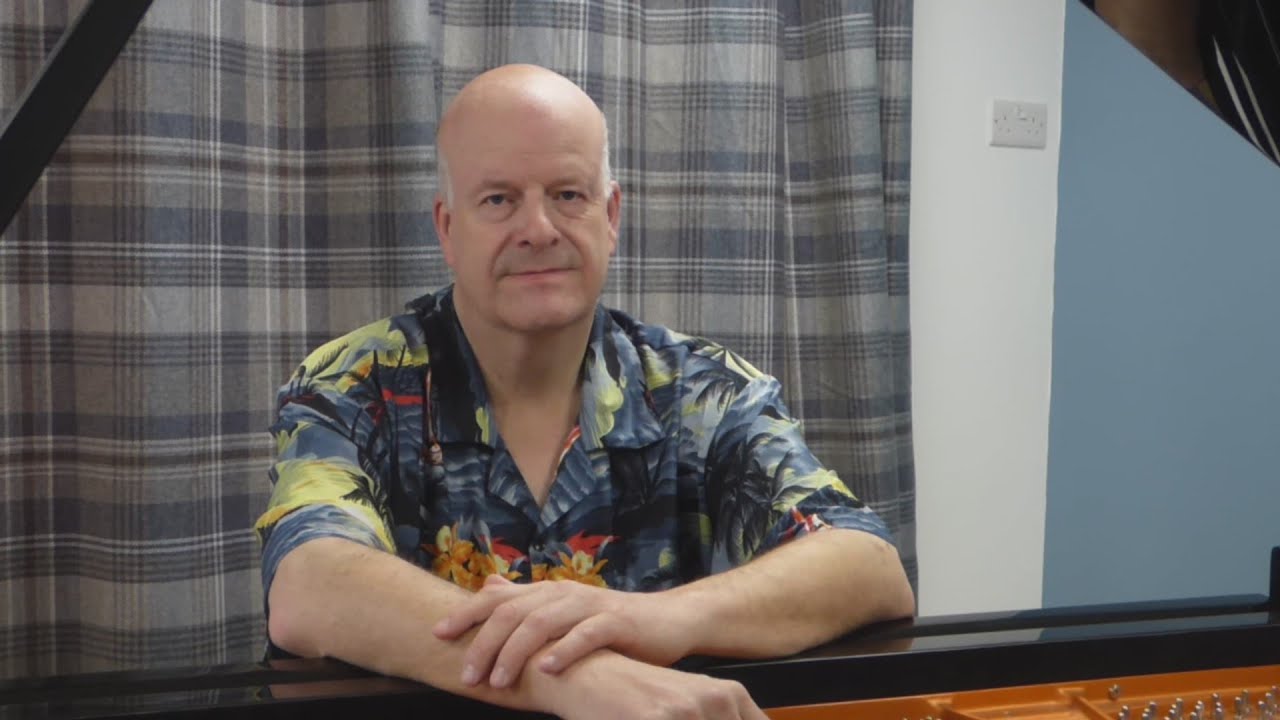 Neil Hilgrove Colledge plays the theme of Hitman Redemption. - YouTube