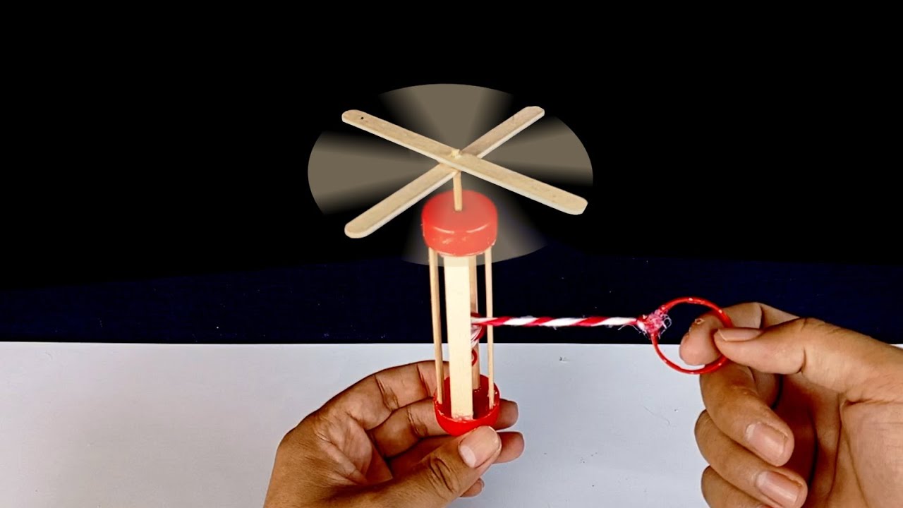 How To Make a Popsicle stick Hand Fan | วิธีทำพัดลมจากไม้ไอศกรีม - YouTube