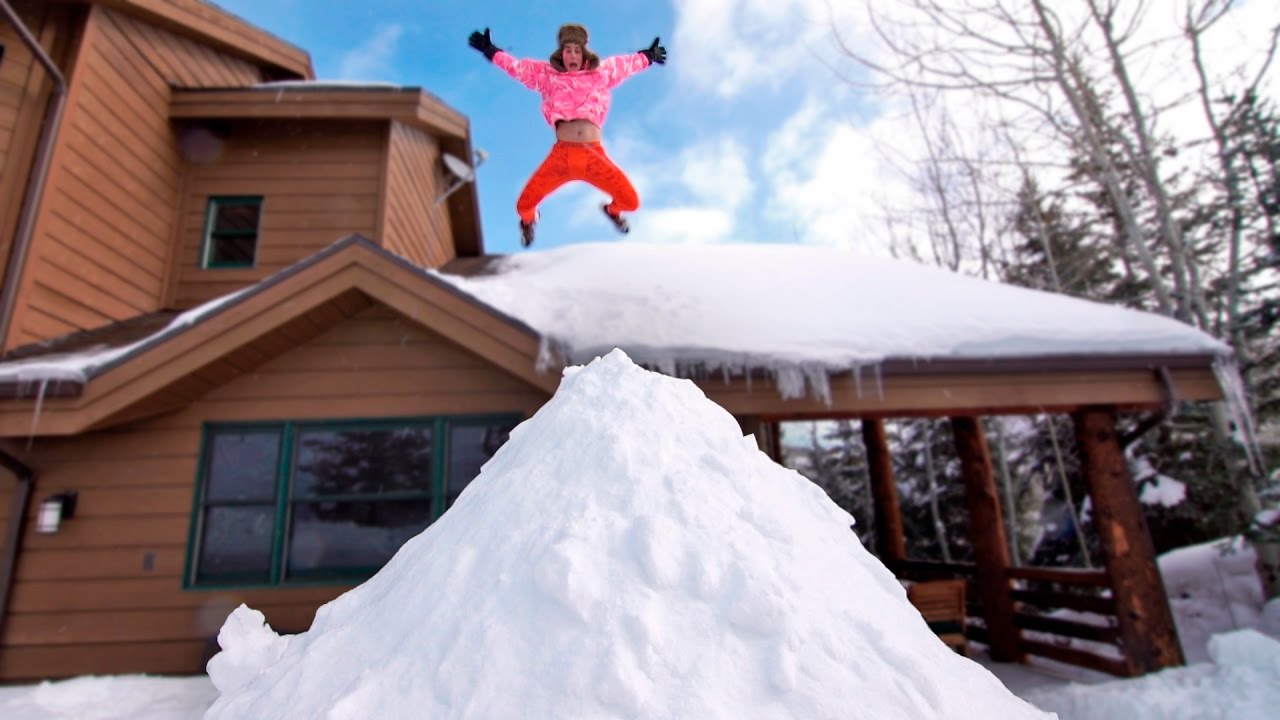 ROOF JUMPING INTO GIANT SNOW PILE - YouTube
