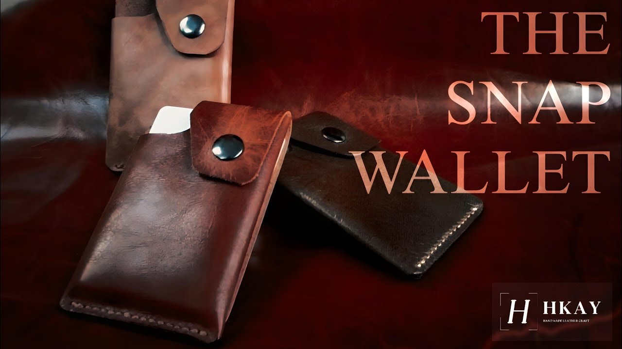 Discover the elegance of the Snap Wallet, crafted from premium leather ...