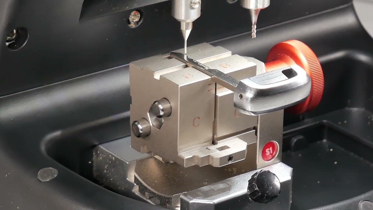 Cutting Ford/Jaguar HU101 Keys Using the Black Widow Key Machine - YouTube