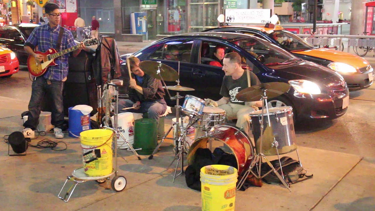 Busking using household object as musical instrument at Toronto Canada ...