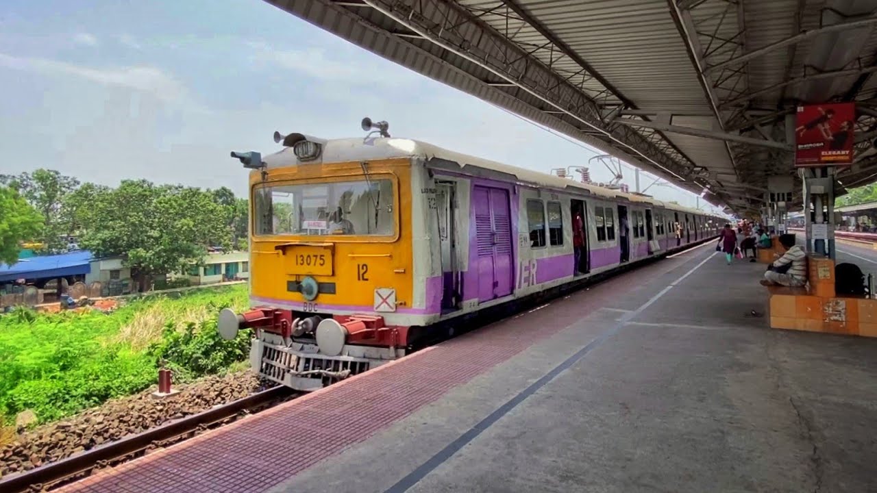 Shiny colorful EMU train arrival followed by a furious speedy Express ...