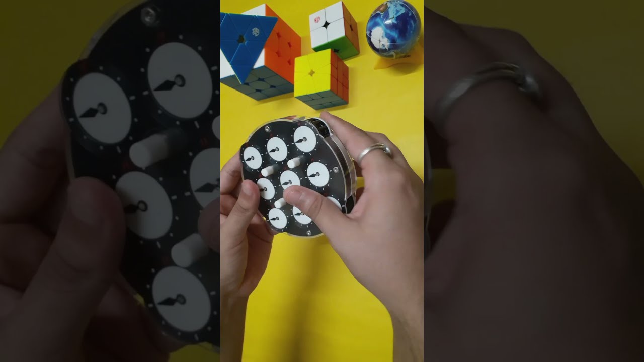Solving A Rubik's Clock #shorts - YouTube