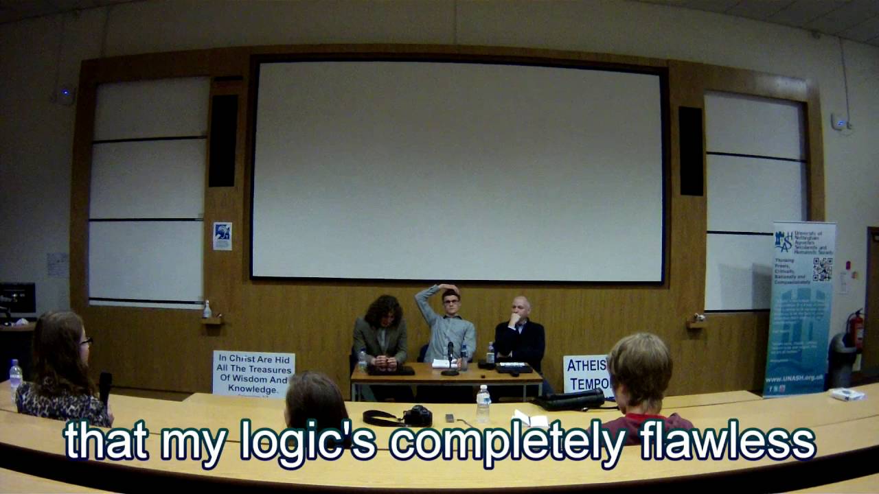 ATHEIST IN DEBATE AUDIENCE GIVES UP ATHEISM - YouTube