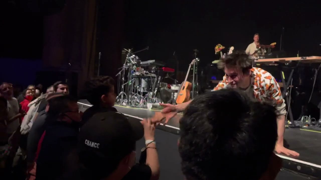 Close up interaction of Jacob Collier with little kid - YouTube