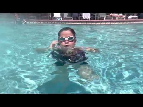 Addison does a flip and handstand in the pool!