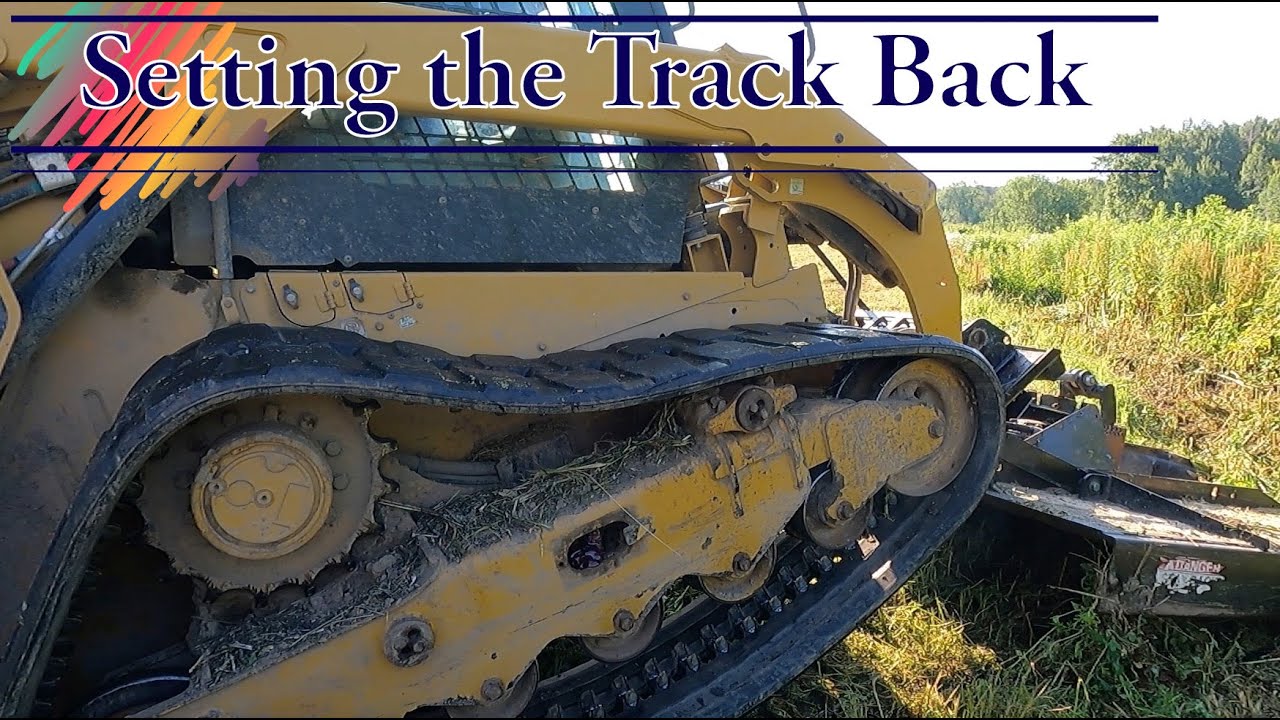 Putting the Track Back On the Skid Loader - YouTube
