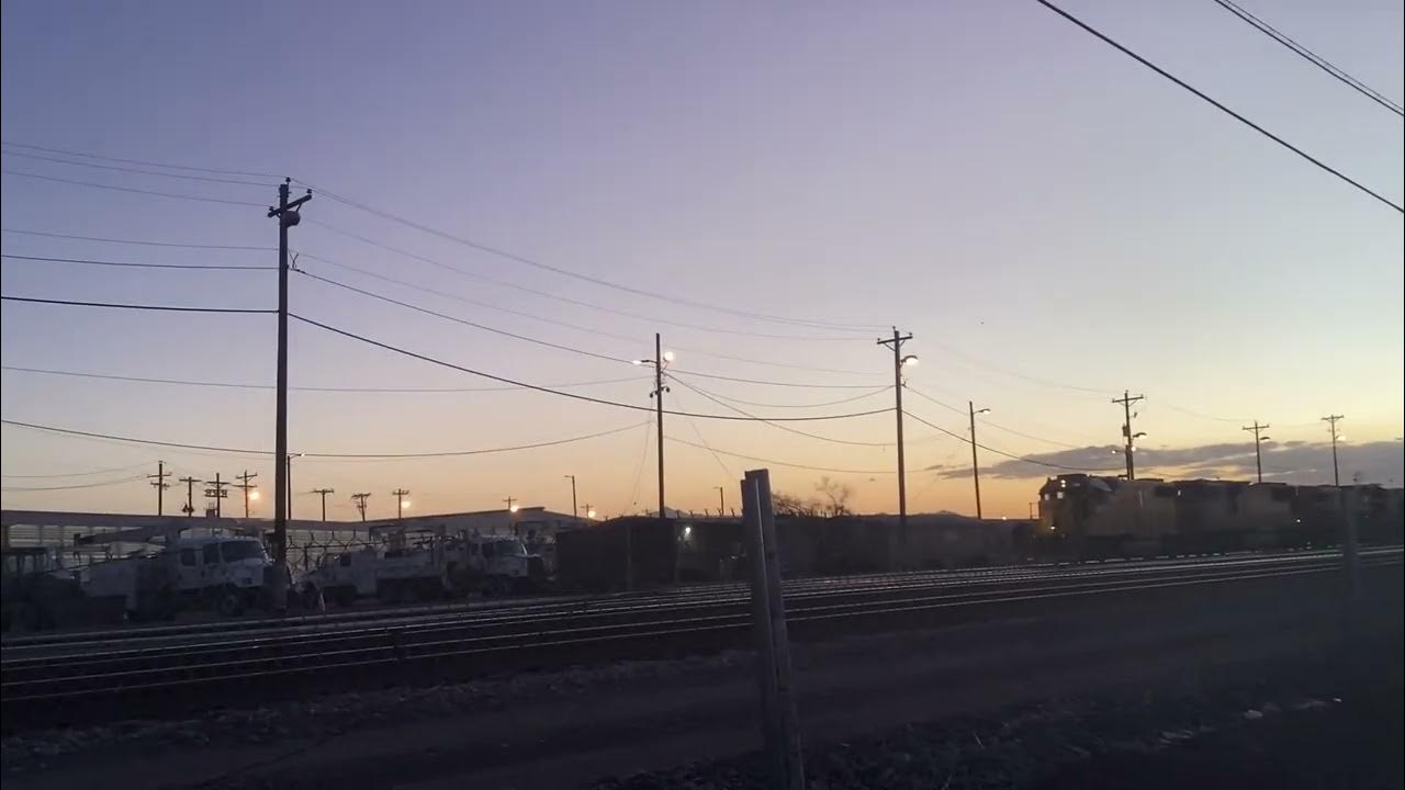 UP 4869 pulls forward and goes under the bridge along with 804 - YouTube