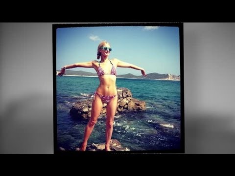 Paris Hilton Flaunts Her Figure in a Zebra Print Bikini in Ibiza - Splash News | Splash News TV