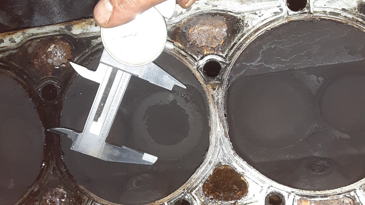 350 4 bolt main tear down. 194 valve heads. - YouTube