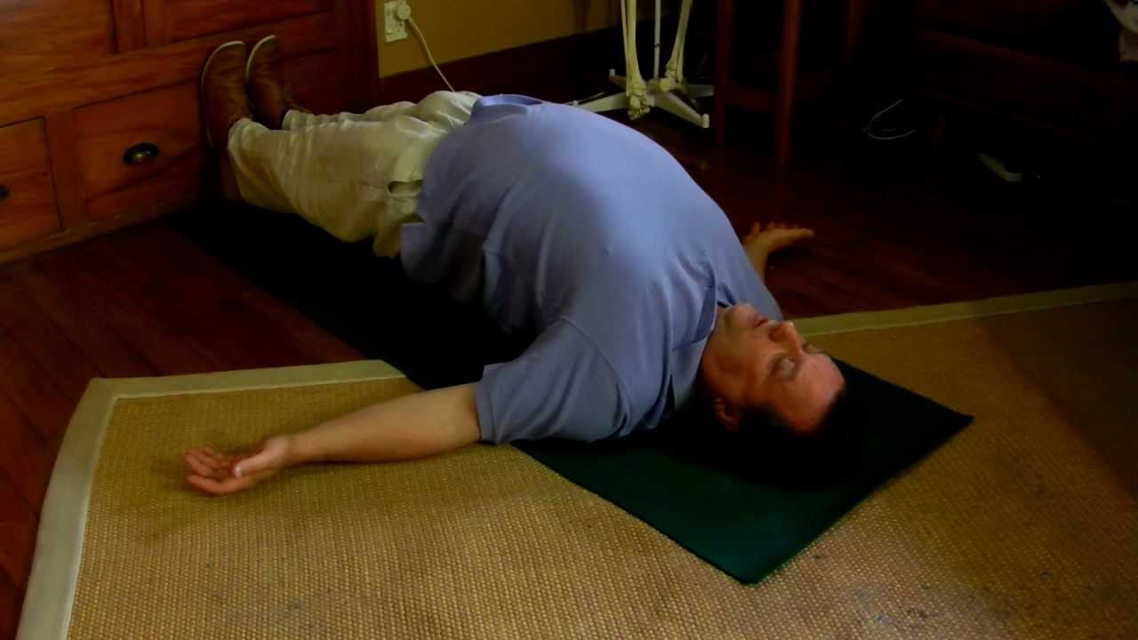 horizontal shoulder stand (lying on bolster) to stretch upper back ...