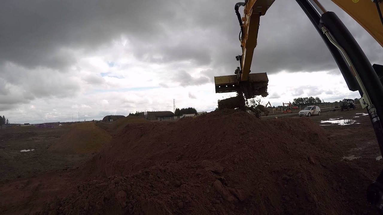 JCB mini excavator moving sand - YouTube