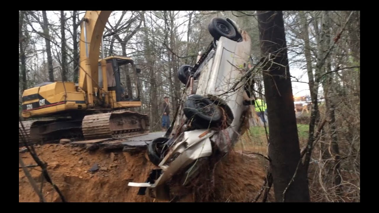 Trackhoe Rescues Car! Road Washout Accident Disaster Excavator ...