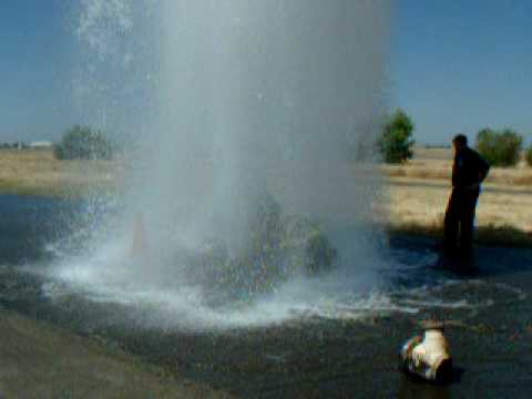 Shutting off a sheared hydrant. - YouTube