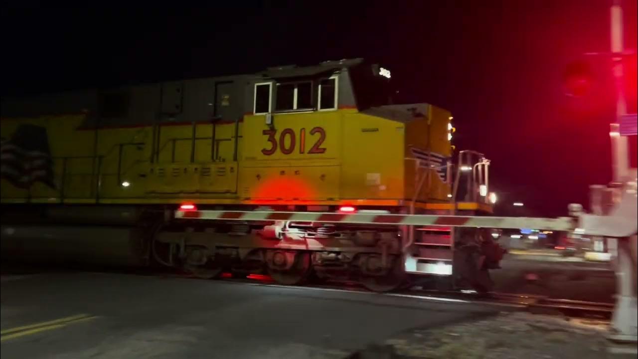 Railroad crossing - UP 3012 leads westbound In Conway, AR (Wayside Horn Version) - YouTube