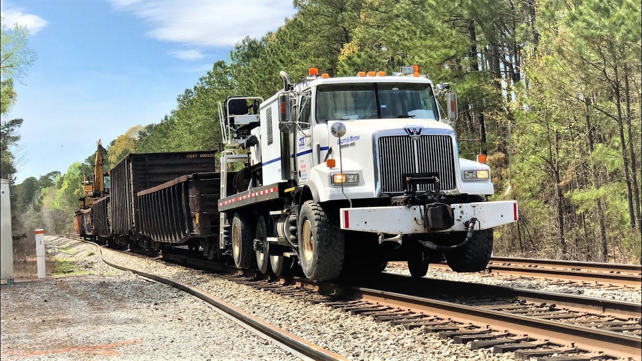 CSX Brandt Truck & OTM Tracker Dropping Tie Plates - YouTube