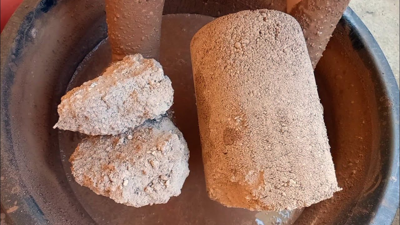 ASMR dusty red dirt chunks cylinder crumbling in water dry dipping ...