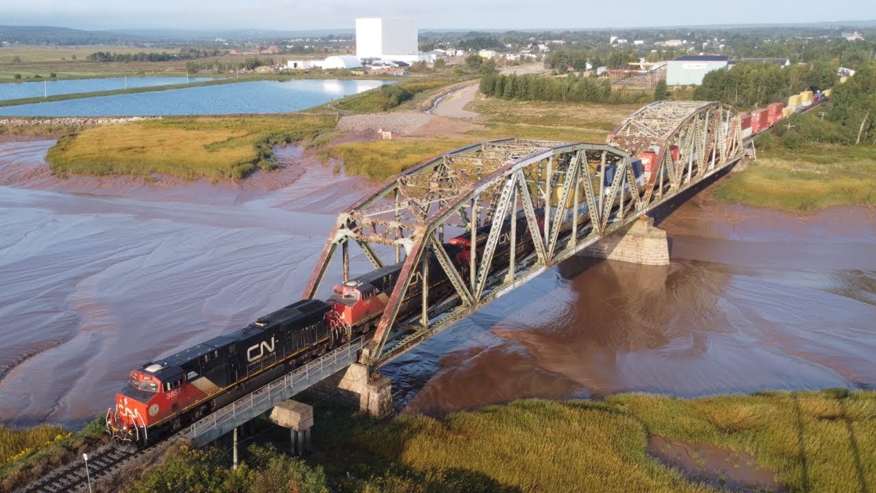 Awesome Aerial 4K View! Long Stack Train CN 120 w/DPU Crossing Bridge ...