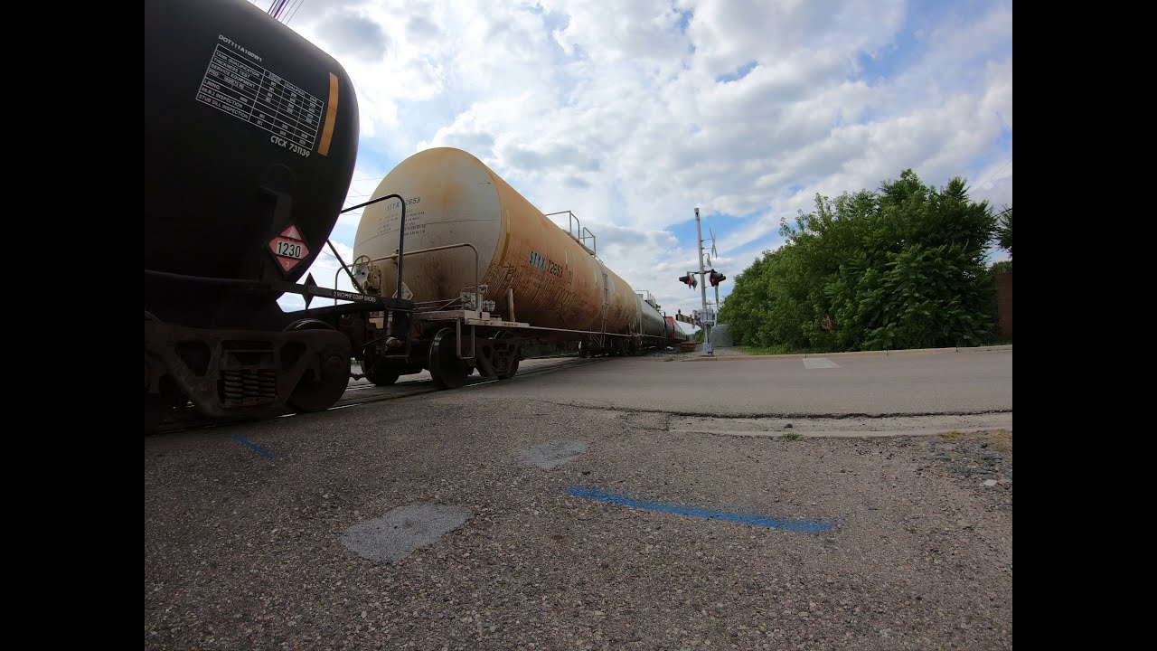 Moving Fast Through Downtown Plymouth - CSX Engine 5299 & CSX 5223 ...