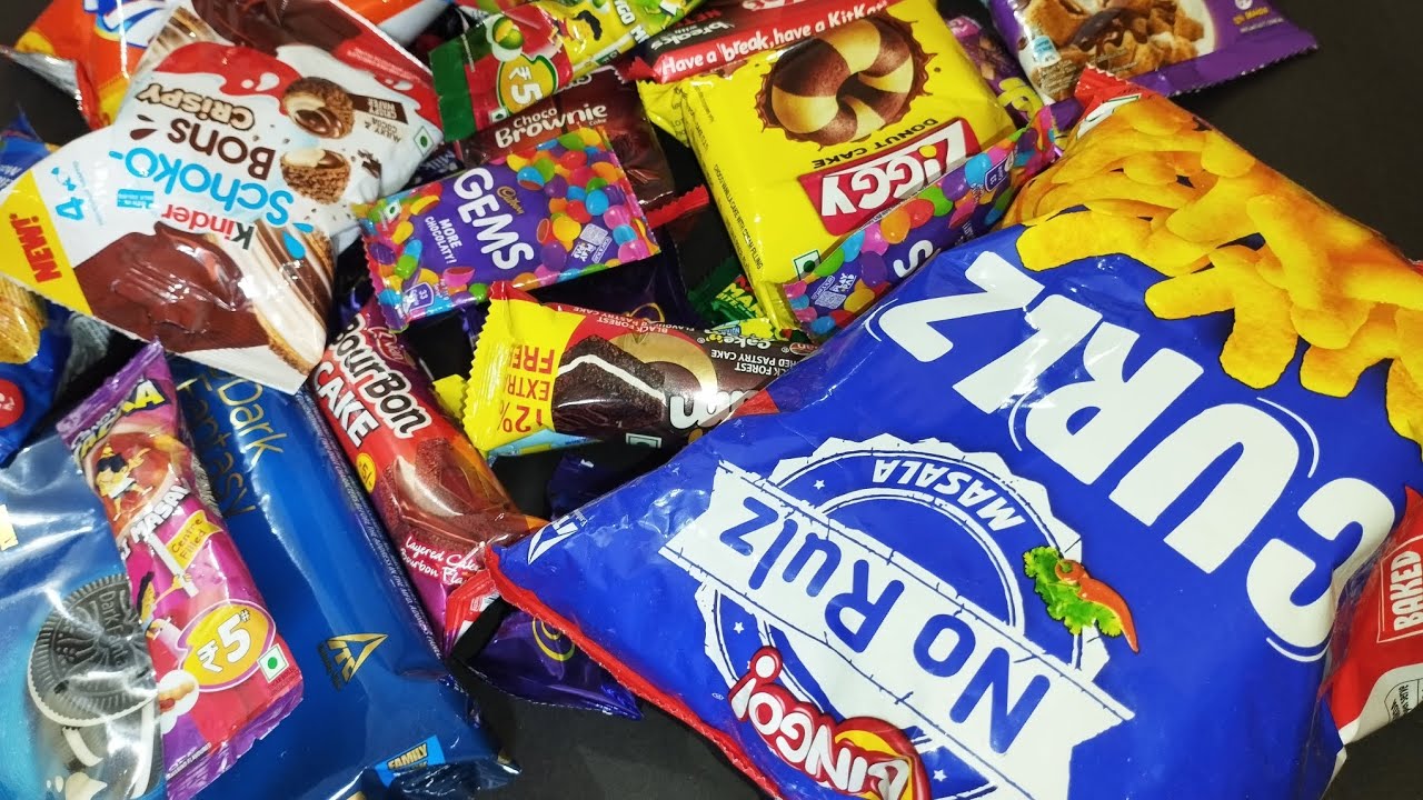 Lots of candies, chocolate, biscuits, surprise toys, snacks opening ...