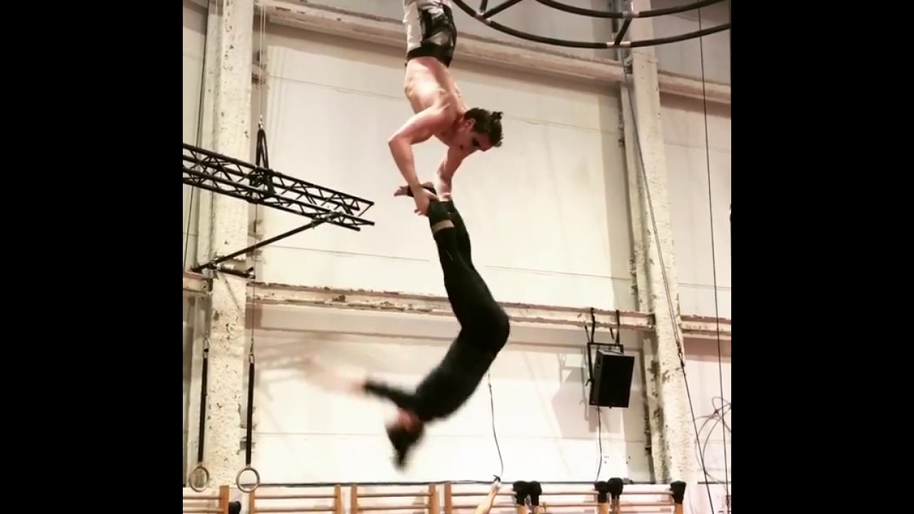 Girl Swings on Partner Hanging Upside Down - YouTube