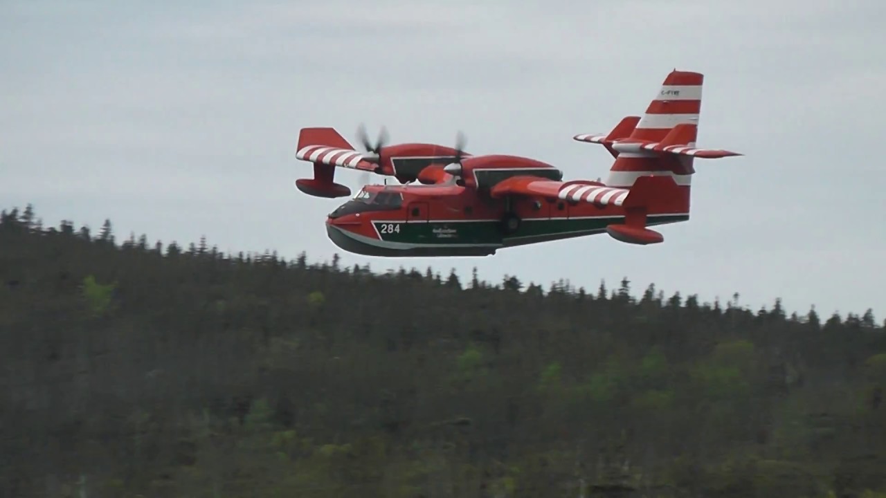 CL 415 tanker 284 pickup water at Paddy's Pond NL Canada - YouTube