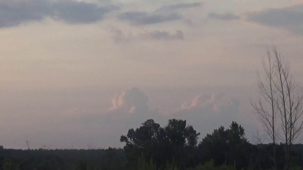 SUNSET, STRANGE CLOUD FORMATIONS, and A SHAPE SHIFTING FLYING OBJECT ...