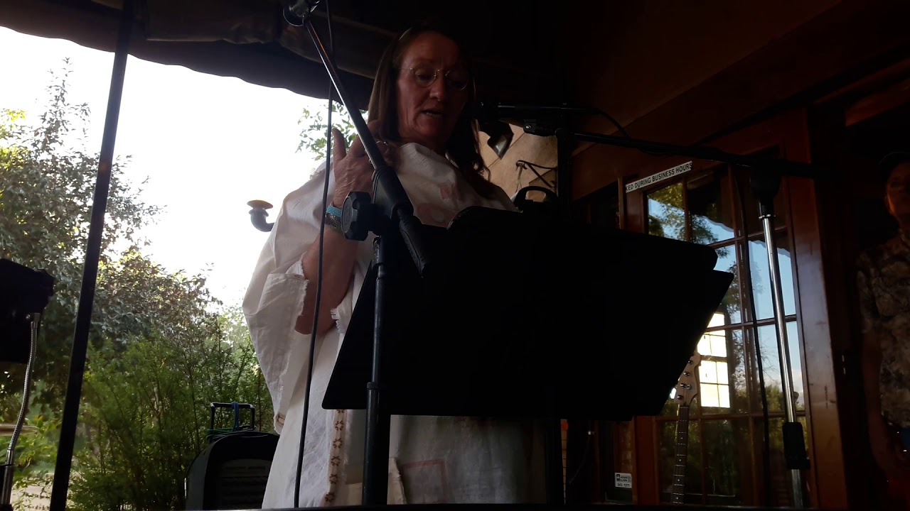 Tami McDowell presenting her poetry at the rolling river open Mic ...