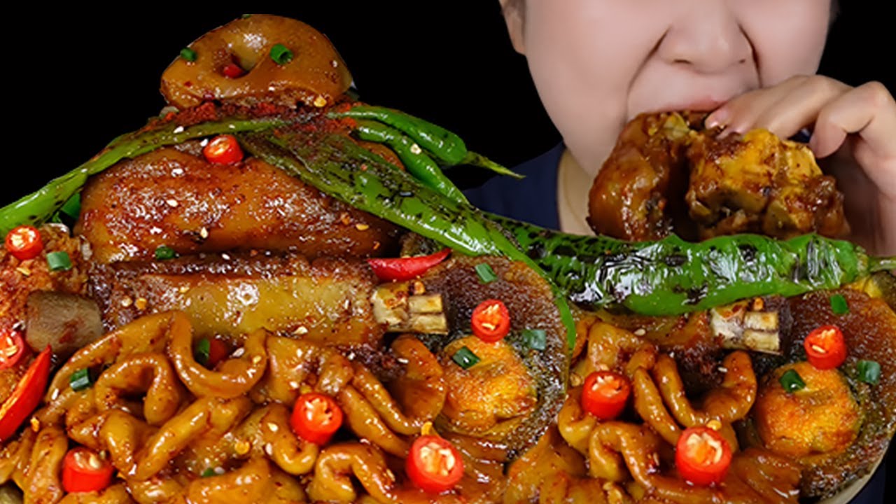 Eating braised pork intestines, pork ribs, pork elbow - YouTube